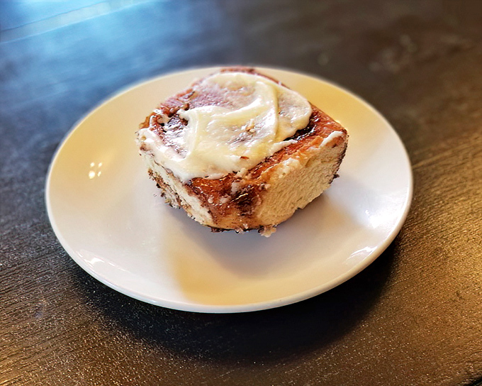 This isn't just a cinnamon roll&mdash;it's edible architecture, a spiral of buttery perfection that makes you wonder why you ever settled for less.