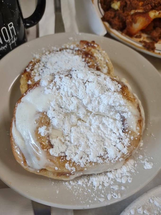 Not all heroes wear capes&mdash;some wear powdered sugar. These cinnamon rolls arrive looking like they just won a confectionary beauty pageant.