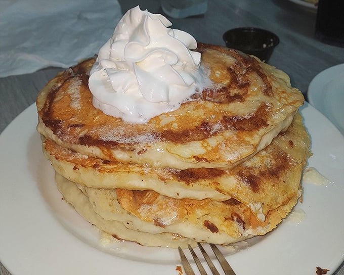 Behold the famous cinnamon roll pancakes - fluffy towers of joy that have earned their statewide reputation deservedly.