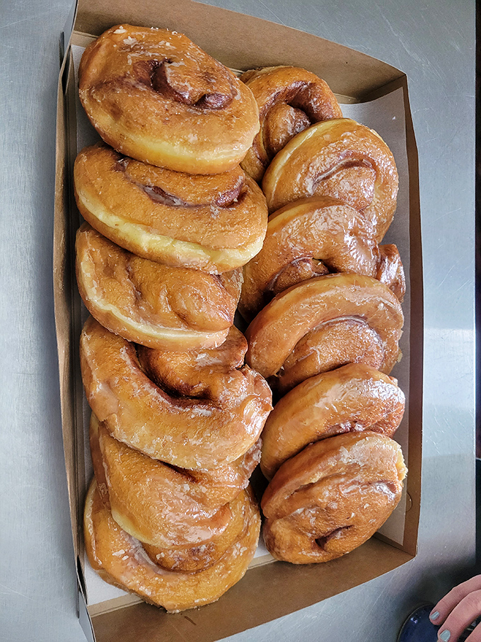 Cinnamon rolls so magnificent they deserve their own ZIP code. These spiral wonders make those mall versions look like sad, distant cousins.
