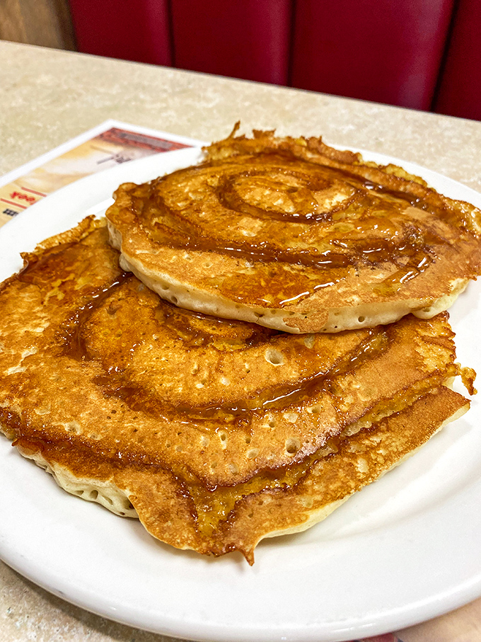 Cinnamon swirl pancakes that make you question every other breakfast decision you've ever made&mdash;golden, spiraled perfection waiting for maple's embrace.