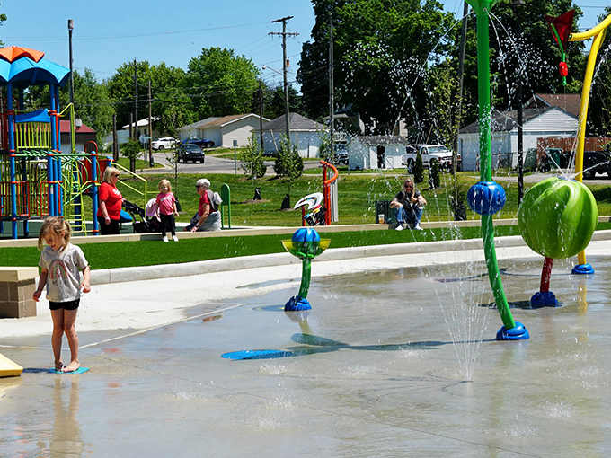 Nothing says "summer in small-town America" quite like children dancing through colorful water features. This splash pad brings joy by the gallon.