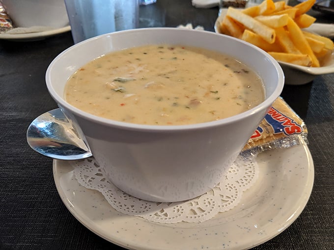 This isn't just clam chowder; it's a creamy bowl of New England nostalgia that somehow found its perfect home in Florida.