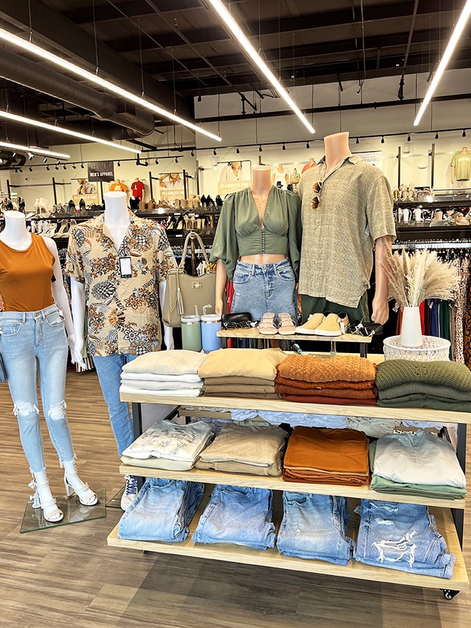 Fashion mannequins standing at attention, showcasing outfits that whisper "designer" but scream "deal." That sage green top is practically begging for a new home.