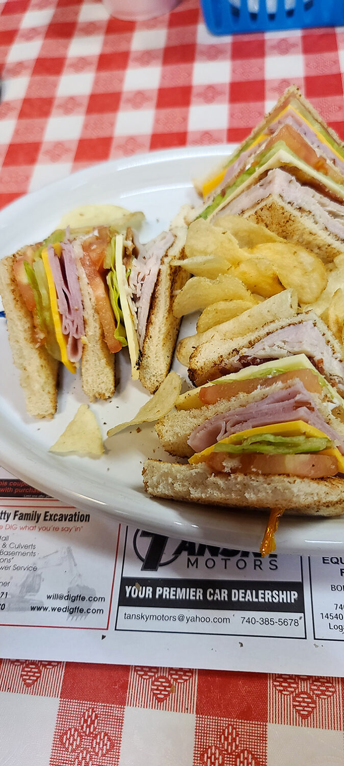 This club sandwich doesn't need a membership application. Stacked higher than Ohio's ambitions, with layers that create perfect harmony in every bite.