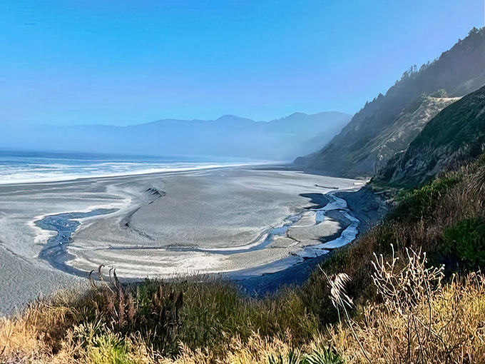 The beach's distinctive black canvas creates natural rivers of contrast when freshwater streams meet the mighty Pacific.