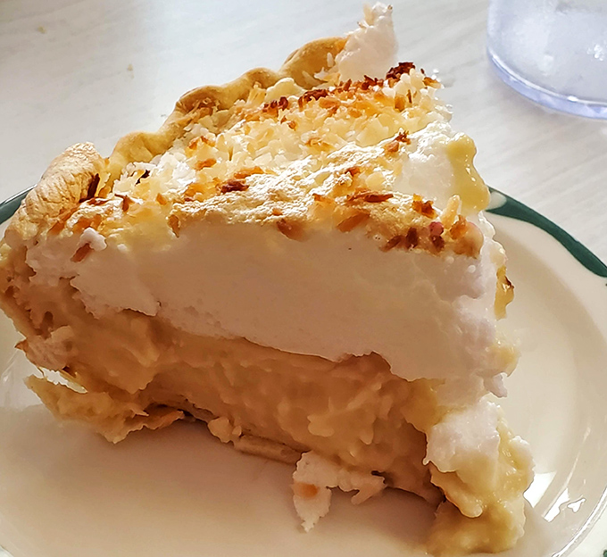 The coconut cream pie stands tall and proud, its meringue peaks toasted to perfection&mdash;architecture so beautiful it deserves its own zip code.