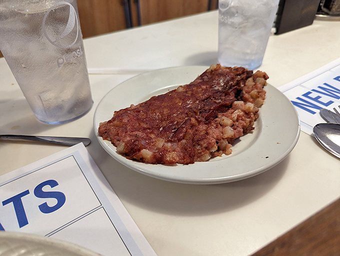 Corned beef hash with that perfect crispy-to-tender ratio – the breakfast equivalent of hitting all green lights on your morning commute.