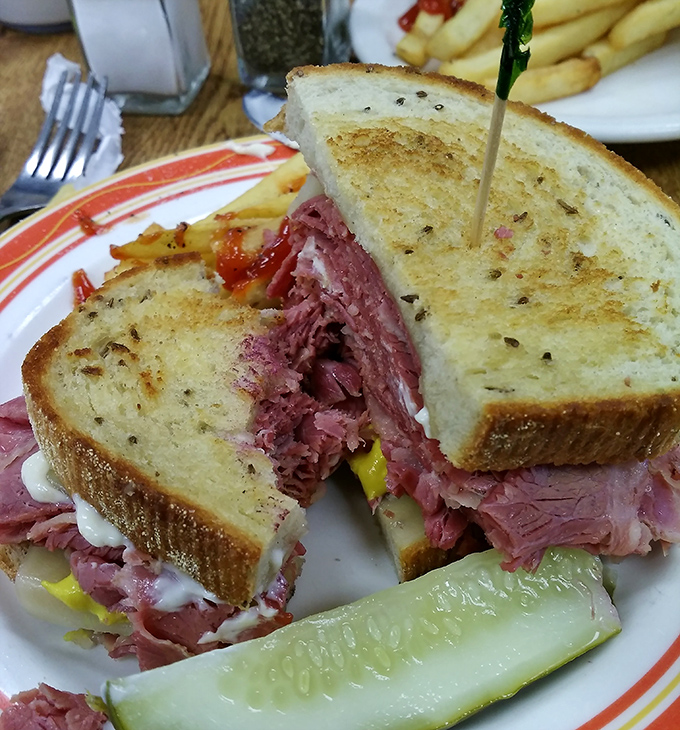This isn't a sandwich, it's a meat skyscraper that requires an engineering degree to navigate properly.