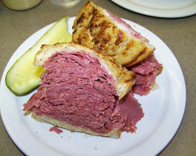 Not so much a sandwich as a geological event &ndash; layers upon layers of perfectly pink corned beef barely contained by grilled rye.