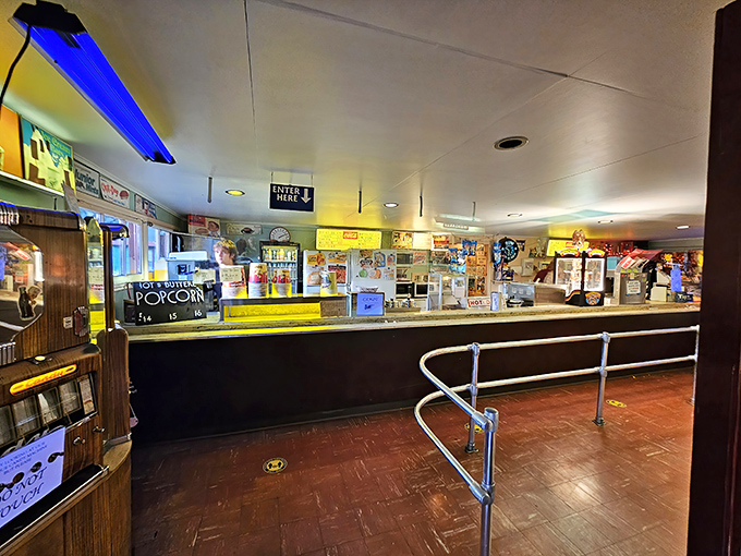 The concession counter isn't just selling snacks; it's dispensing nostalgia by the handful, with every butter-drenched kernel and fizzy soda.
