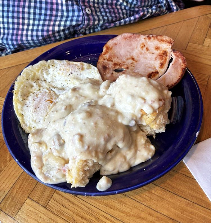 Country gravy: the breakfast equivalent of a warm hug. This hearty plate smothers a biscuit with creamy comfort that could power you through a day of skiing.