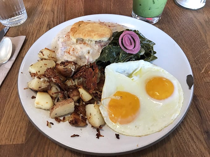 Two sunny-side eggs stare back at you like optimistic eyes saying, "Your day is about to get significantly better." Those potatoes didn't come from a freezer bag, folks.