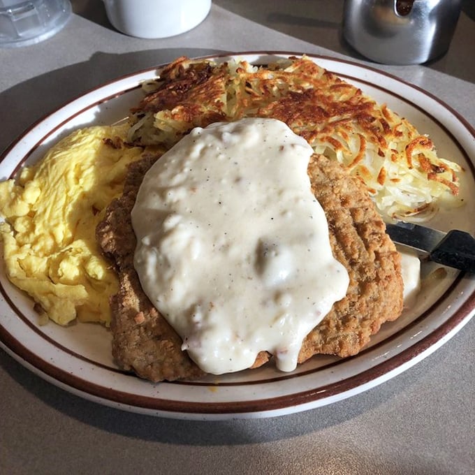 Country fried steak that's crispy on the outside, tender within, and swimming in gravy that would make your grandmother nod with approval.