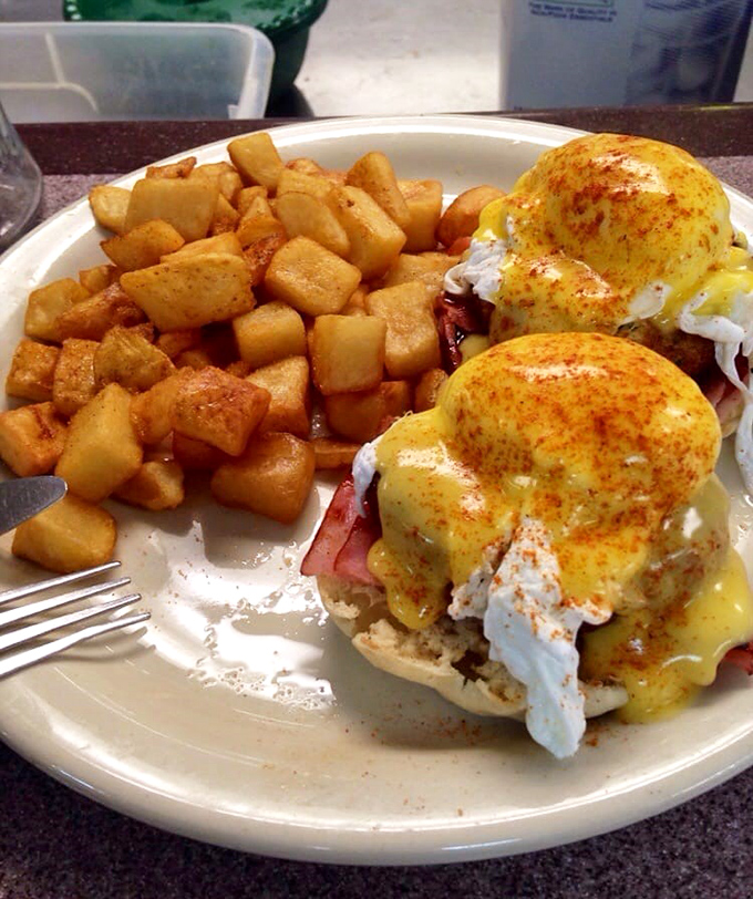 Behold the star of our show: Crab Cake Benedict with golden home fries. Whoever said "breakfast of champions" clearly ate here first.