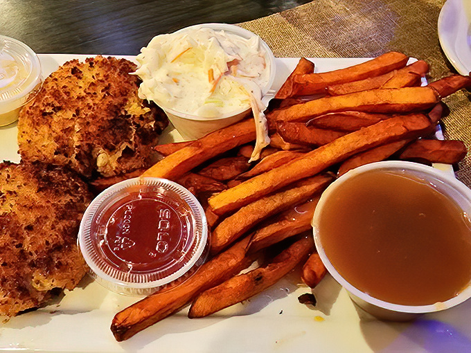 Golden-brown perfection on a plate&mdash;these crab cakes have the ideal meat-to-filler ratio that would make Maryland jealous. Pure crab bliss with sweet potato fries.