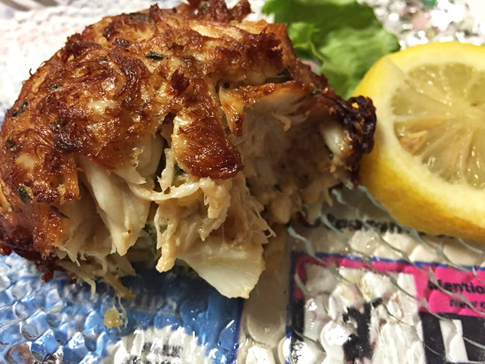 Behold the golden perfection: crab cakes so loaded with sweet meat, they practically swim off the plate.