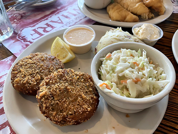 These golden-brown crab cakes aren't playing games—they're packed with actual crab meat, not filler. Revolutionary concept!