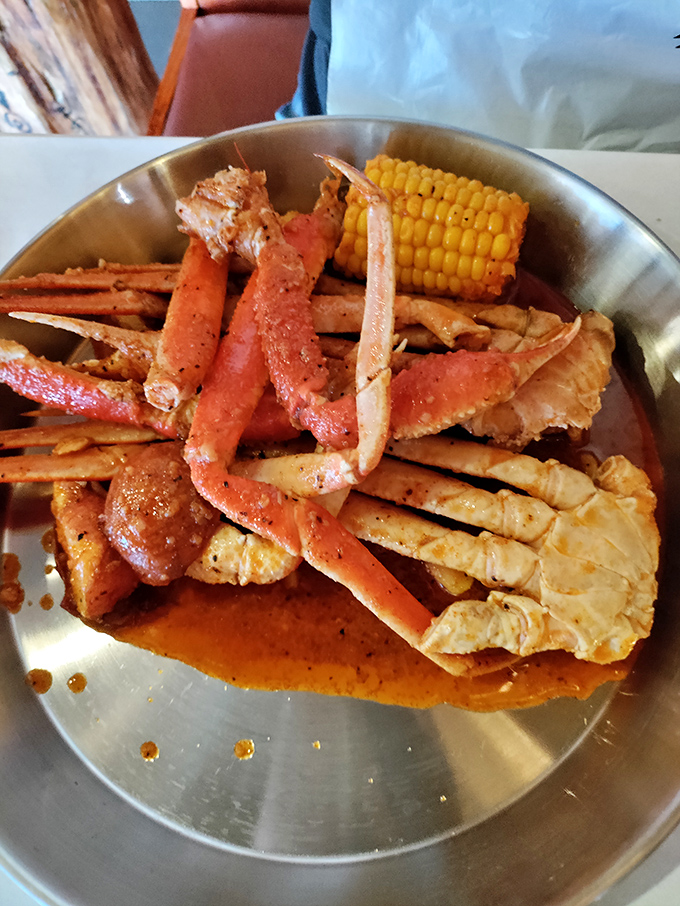Crab legs sprawled majestically in spicy sauce&mdash;nature's perfect design for both maximum flavor extraction and the joy of working for your food.