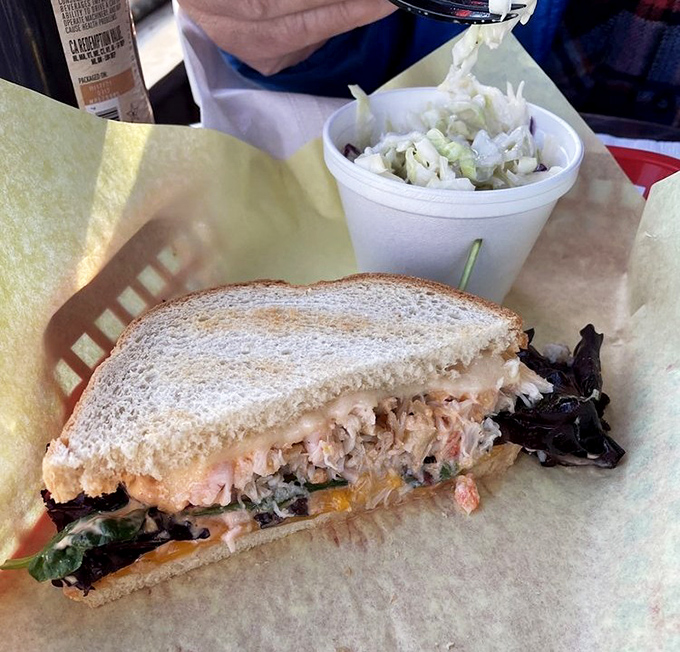 A proper crab sandwich doesn't whisper&mdash;it shouts with sweet meat and tangy sauce, making every other lunch option seem like a compromise.