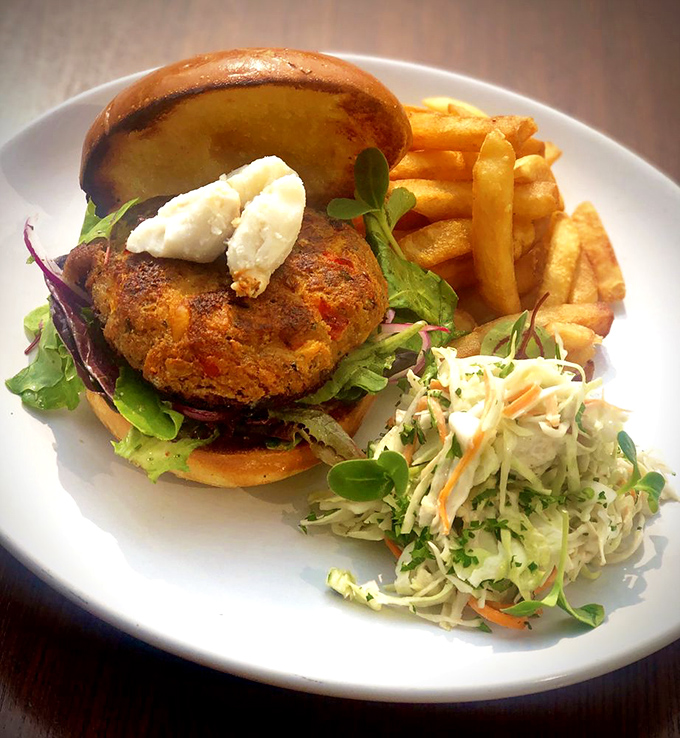 This isn't just a crab cake sandwich; it's a masterpiece of Maryland-style perfection that makes you wonder why you'd ever order anything else.