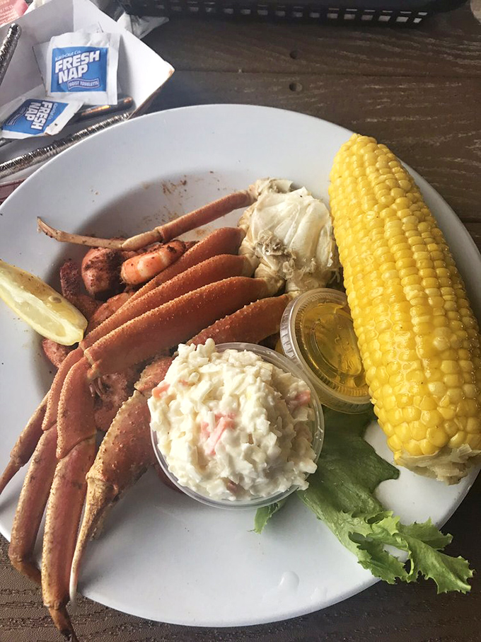 Nature's perfect design: snow crab legs served with corn, slaw, and drawn butter. Some assembly required, but that's half the fun.