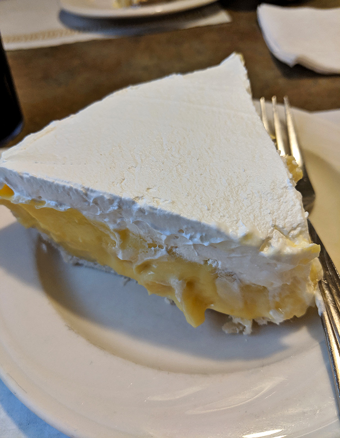 The legendary cream pie in all its glory - with a meringue so tall it practically needs its own zip code.