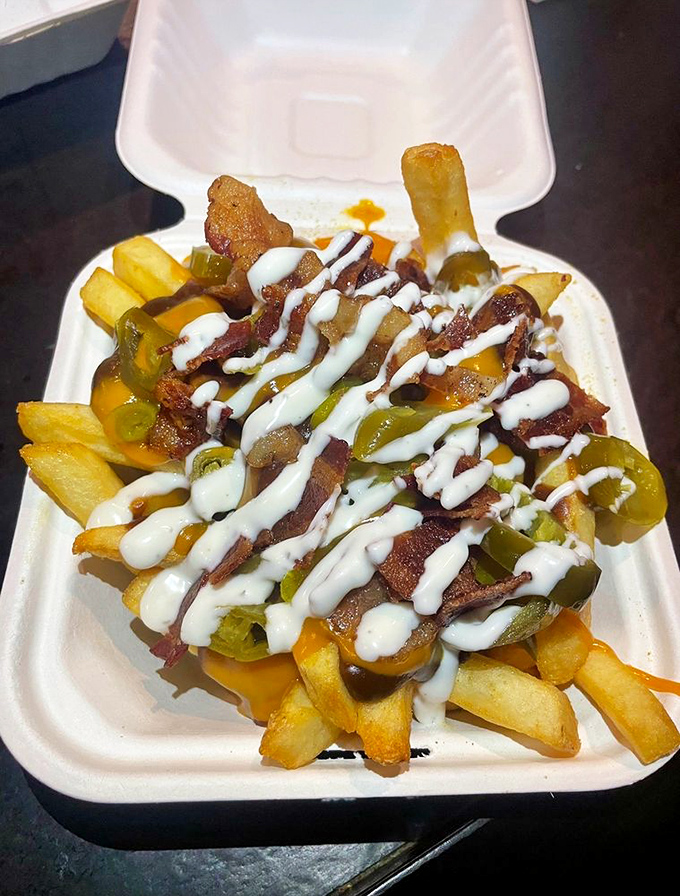 Disco Fries that make you want to do the hustle. Crispy potatoes, melty cheese, bacon bits, and jalape&ntilde;os performing a flavor dance party.