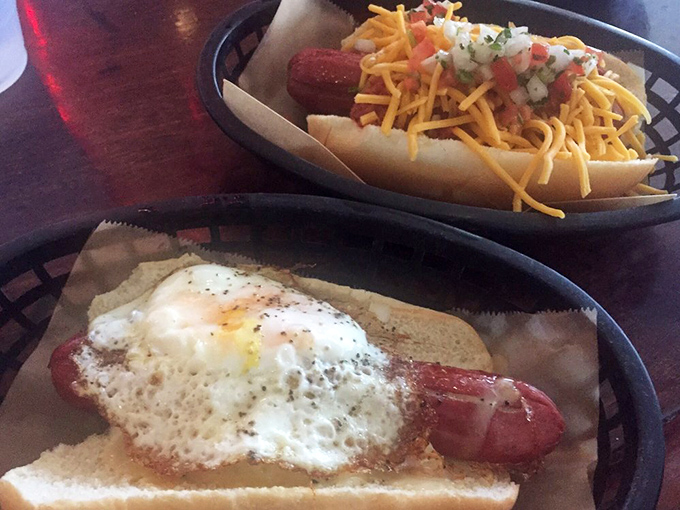 Hot dog nirvana achieved! One topped with melted cheese and fresh tomatoes, the other with a perfectly fried egg. Breakfast, lunch, and dinner all solved in two beautiful baskets.