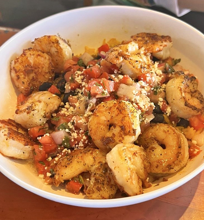 These aren't just shrimp—they're having more fun than you are! Plump Gulf beauties blackened to perfection and topped with fresh pico de gallo.