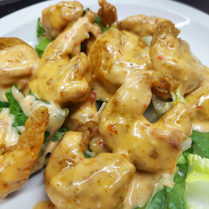 These golden shrimp swimming in creamy sauce aren't just appetizers&mdash;they're little flavor bombs that make you question why you'd ever eat anything else.