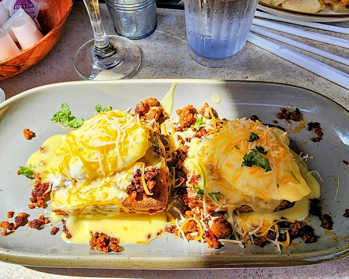 Eggs Benedict nirvana! These golden-topped beauties with their river of hollandaise would make even the most jaded breakfast critic weep with joy.