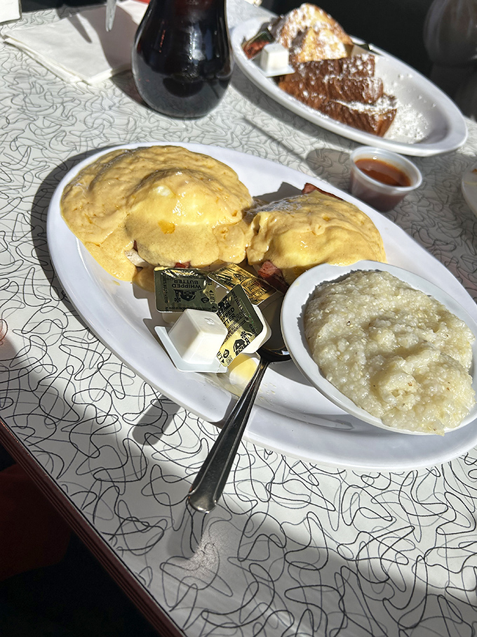 Eggs Benedict that would make the Pope jealous. Hollandaise sauce cascades over English muffins like a yellow waterfall of happiness.
