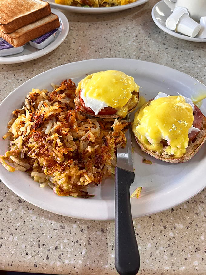 Eggs Benedict: where hollandaise dreams come true. Those crispy hash browns aren't just a side dish&mdash;they're the supporting actor who steals the show.