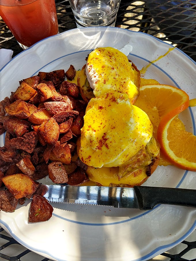 Eggs Benedict reimagined with a Midwestern generosity &ndash; those potatoes aren't just a side, they're practically their own main event.