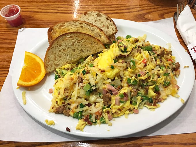 Farmer's scramble: where eggs meet their destiny. A symphony of ingredients that makes you wonder why you ever settled for cereal.