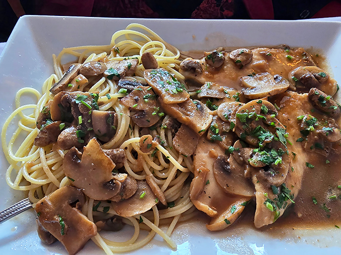 This isn't just pasta&mdash;it's a mushroom lover's dream vacation. Tender fettuccine swimming in a sea of savory sauce that makes you want to book a return trip.