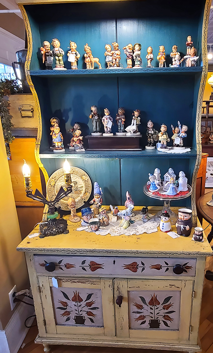 These porcelain figurines stand in silent judgment, waiting for someone to rescue them from their blue cabinet purgatory and give them prime mantel position.