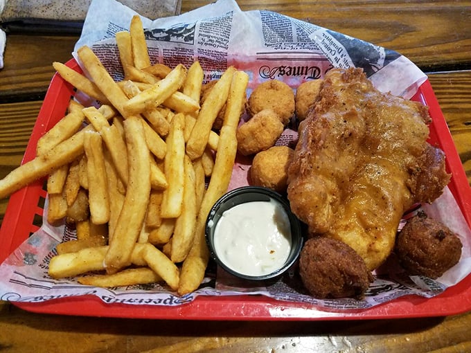 Golden-battered fish that shatters with each bite, paired with fries that could make a Frenchman weep with joy.
