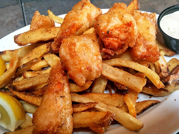 Golden-battered fish perched atop hand-cut fries &ndash; the kind of plate that makes you forget your table manners and dive in headfirst.