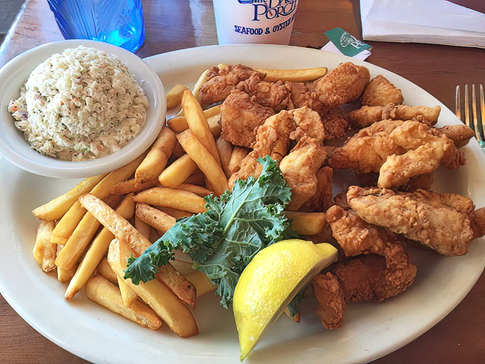 Golden-brown perfection! These fish and chips aren't just a meal &ndash; they're the reason people dream about Destin during landlocked winters.