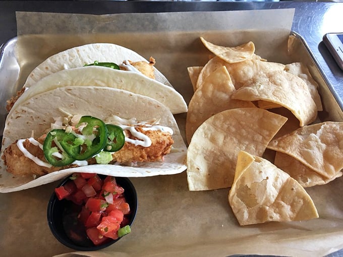 These fish tacos aren't just a meal&mdash;they're an edible coastal postcard. Crispy cod, fresh jalape&ntilde;os, and that white sauce that dreams are made of.