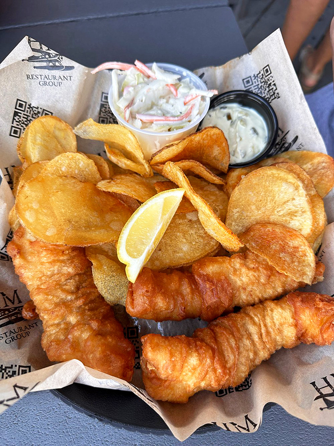 Fish and chips that would make a British pub jealous. Golden, crispy perfection with homemade chips that puts the "art" in "heart attack."