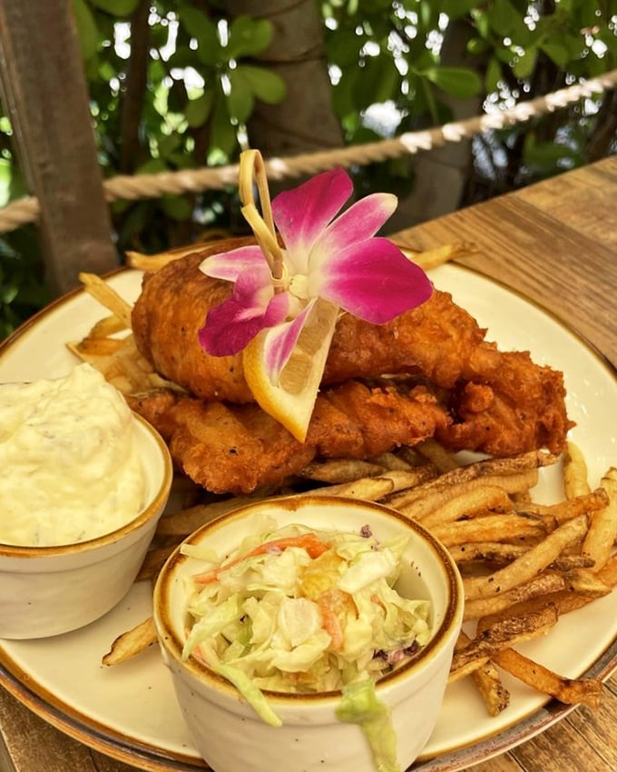 That orchid garnish isn't compensating for anything&mdash;this fish is so fresh it might still have its sea legs. Crispy perfection.