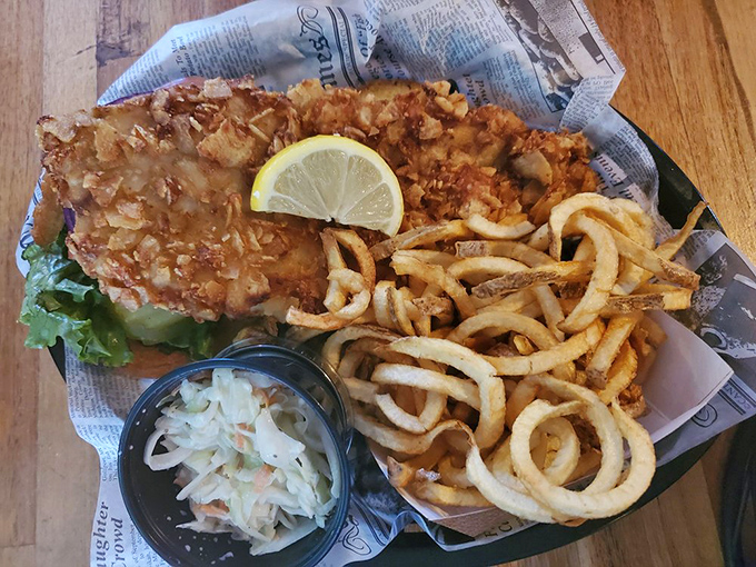 Not your sad cafeteria fish sandwich! This golden-battered beauty with crispy curls and fresh slaw would make Captain Ahab forget all about that whale.
