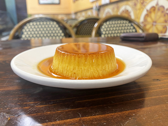 This flan doesn't just wobble—it performs a silky ballet of caramel and custard that would make any dessert aficionado weak at the knees.