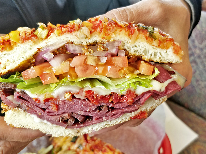 This isn't just a sandwich; it's edible architecture&mdash;layers of pastrami, fresh vegetables, and cheese nestled between focaccia that deserves its own California historical landmark status.