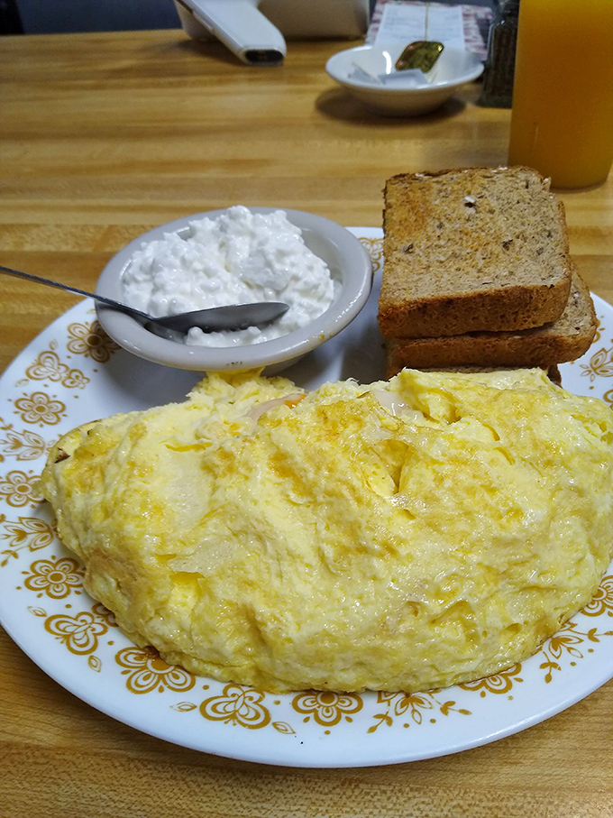 This omelet doesn't just contain cheese&mdash;it celebrates it. Fluffy egg perfection that makes your homemade attempts look like scrambled surrender.