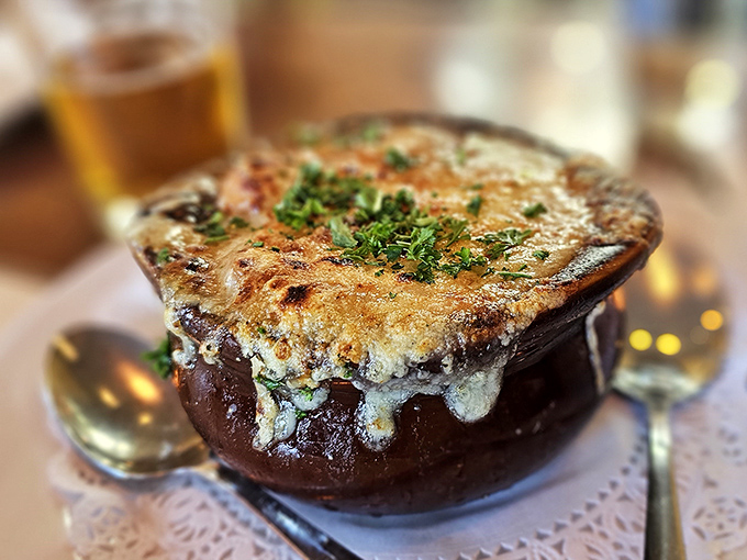 The star of the show: French onion soup with a cheese cap so perfect it deserves its own passport and work visa.