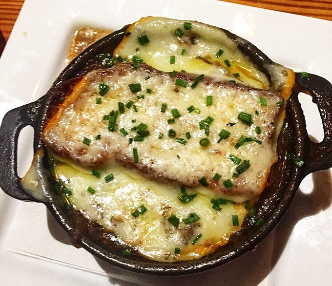The French onion soup that launched a thousand road trips. That cheese pull deserves its own Instagram account and possibly a talent agent. 